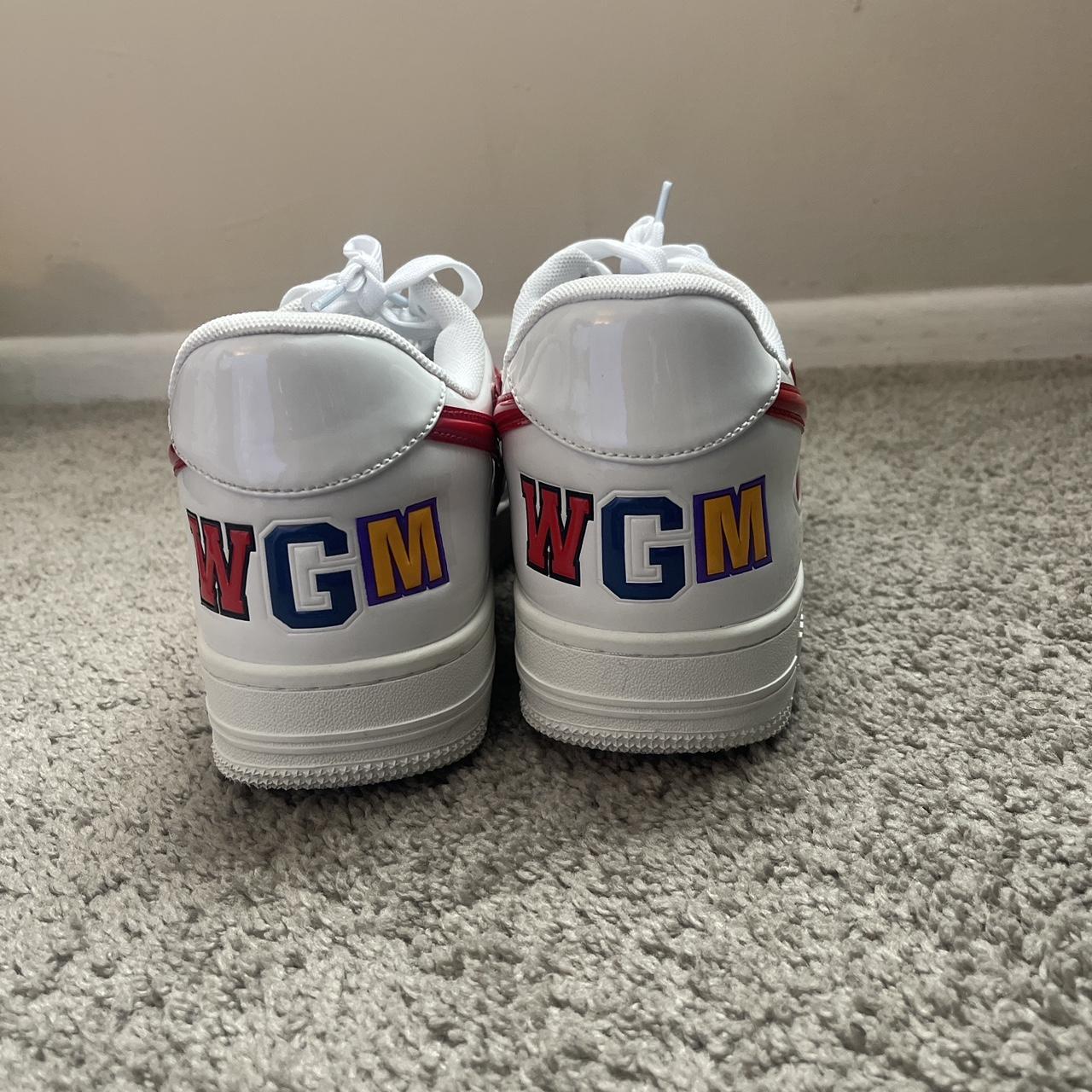 Used white shark bapestas. - Depop