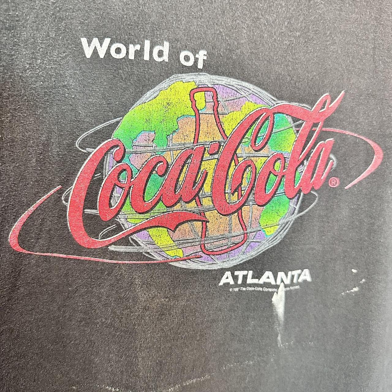 World of Coca Cola Atlanta | Size XL | HEAVY fade... - Depop