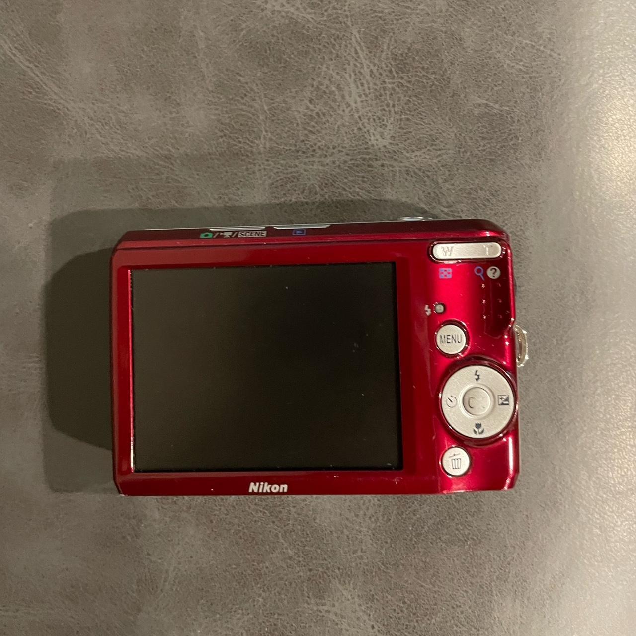 Red Nikon Coolpix Digital Camera - takes the... - Depop