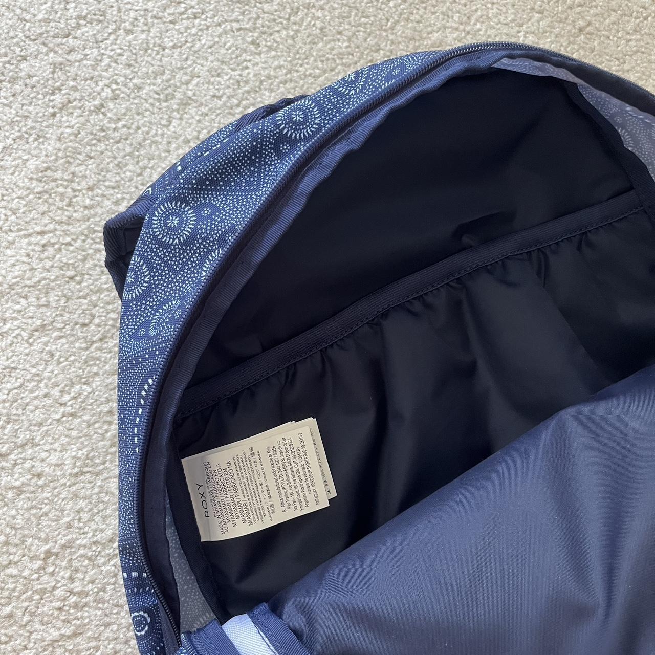 Blue Roxy backpack with 2 main pockets, laptop... - Depop