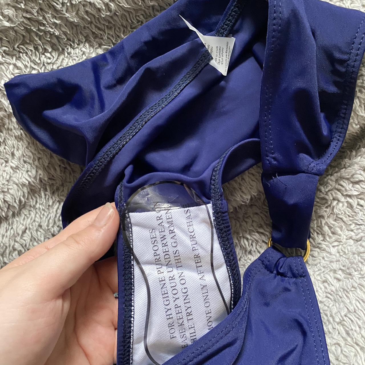 Brand new navy bikini Hygiene strip still in place... - Depop