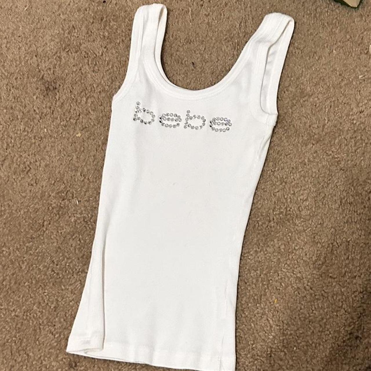 white bebe tank fitted but stretchy - Depop