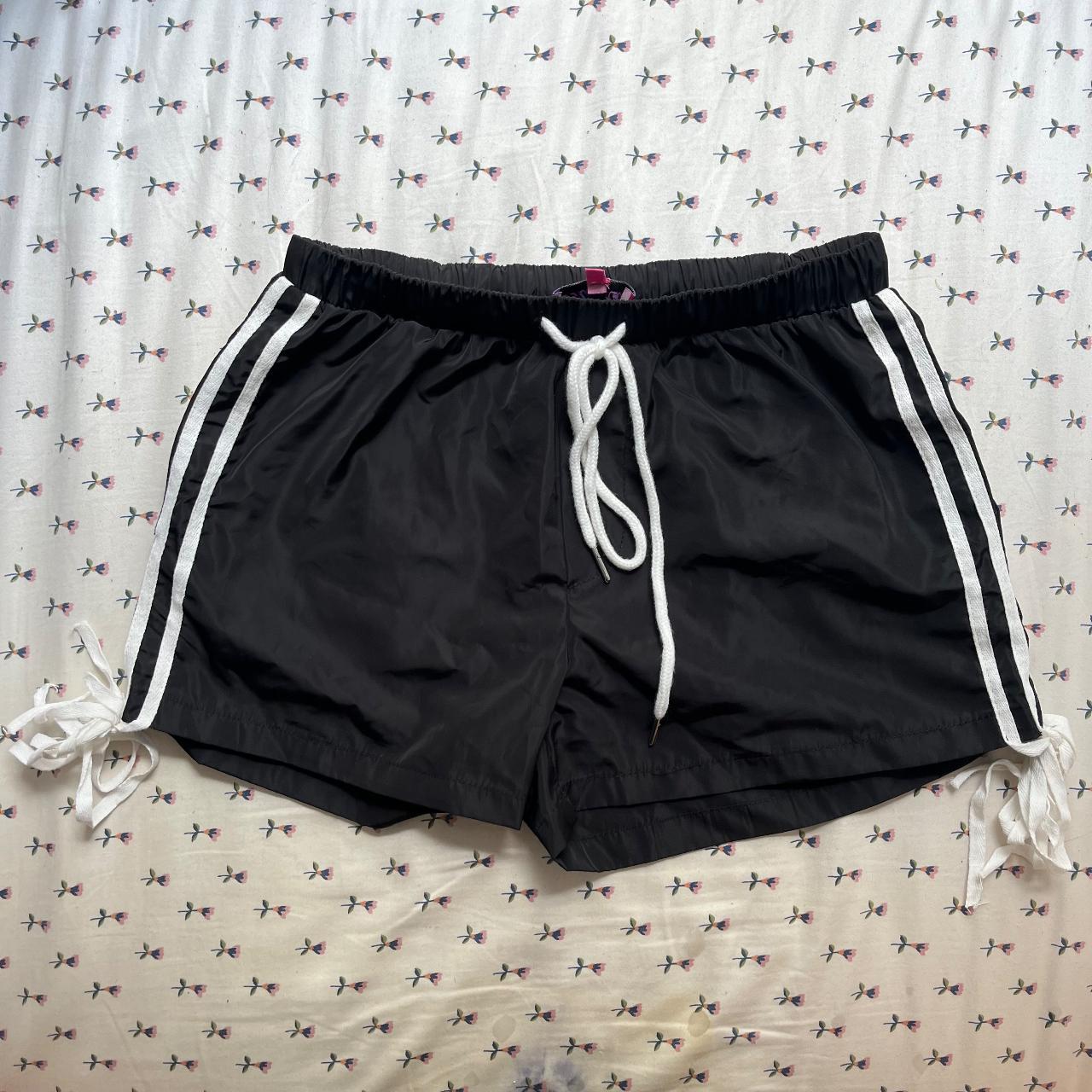 super fun black track shorts with stripes up the... | Depop