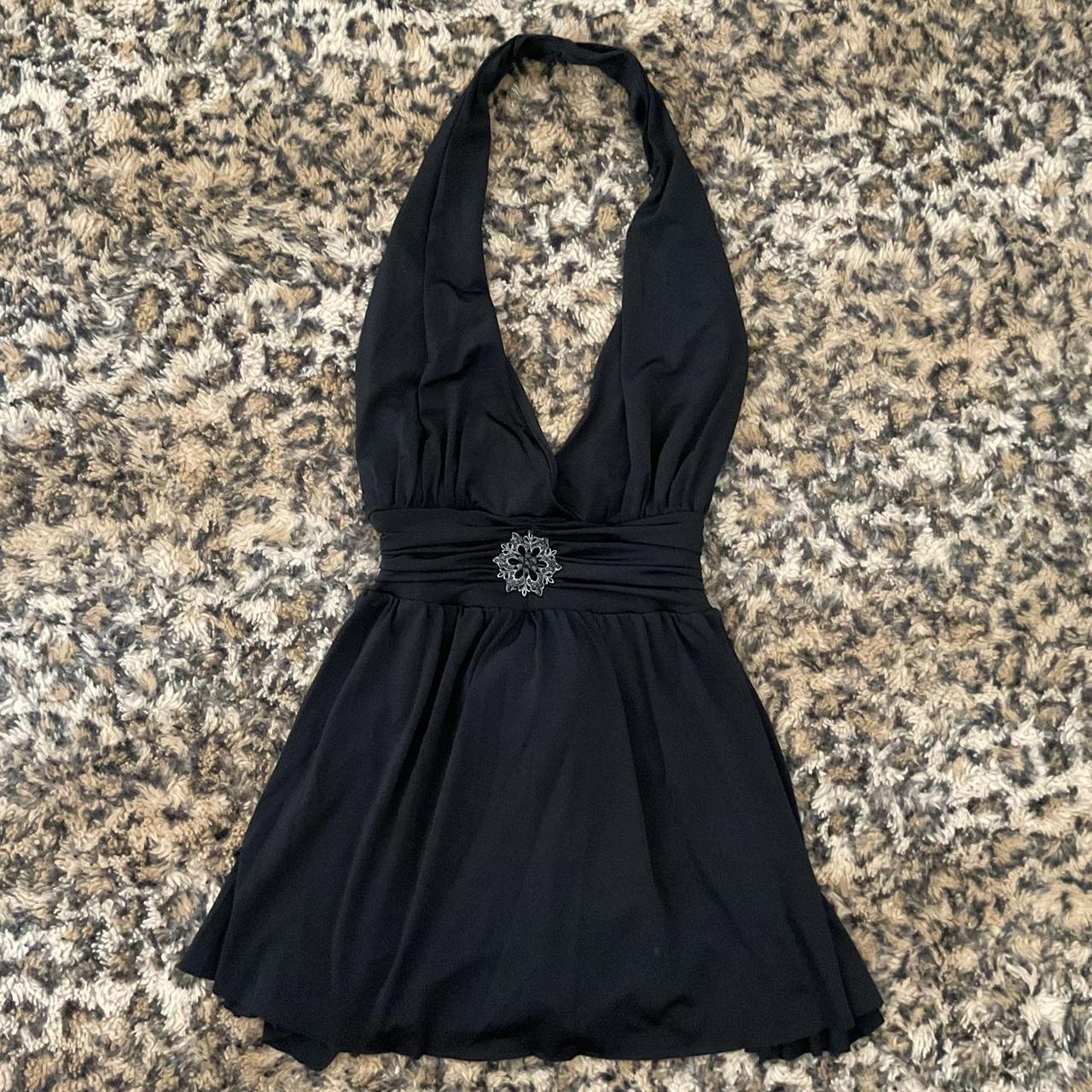 halter top with ornate decal no brand or size tag... | Depop