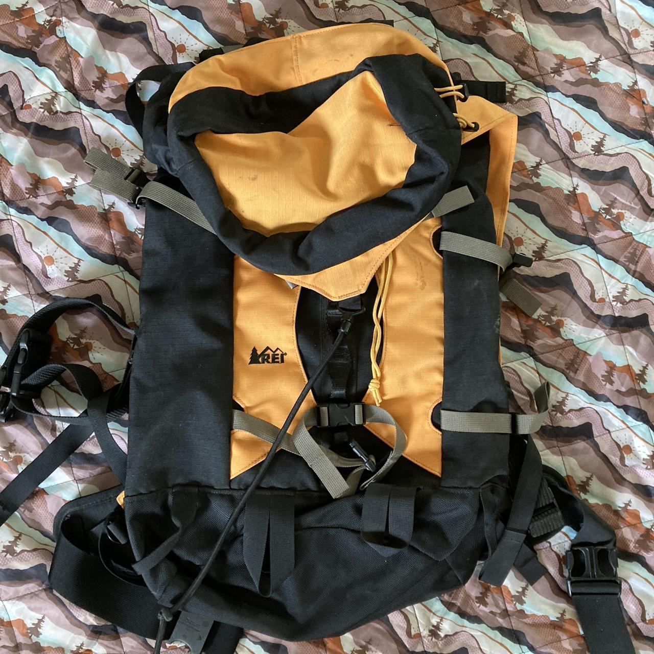 REI Backpacking pack in faded orange. Unknown... - Depop
