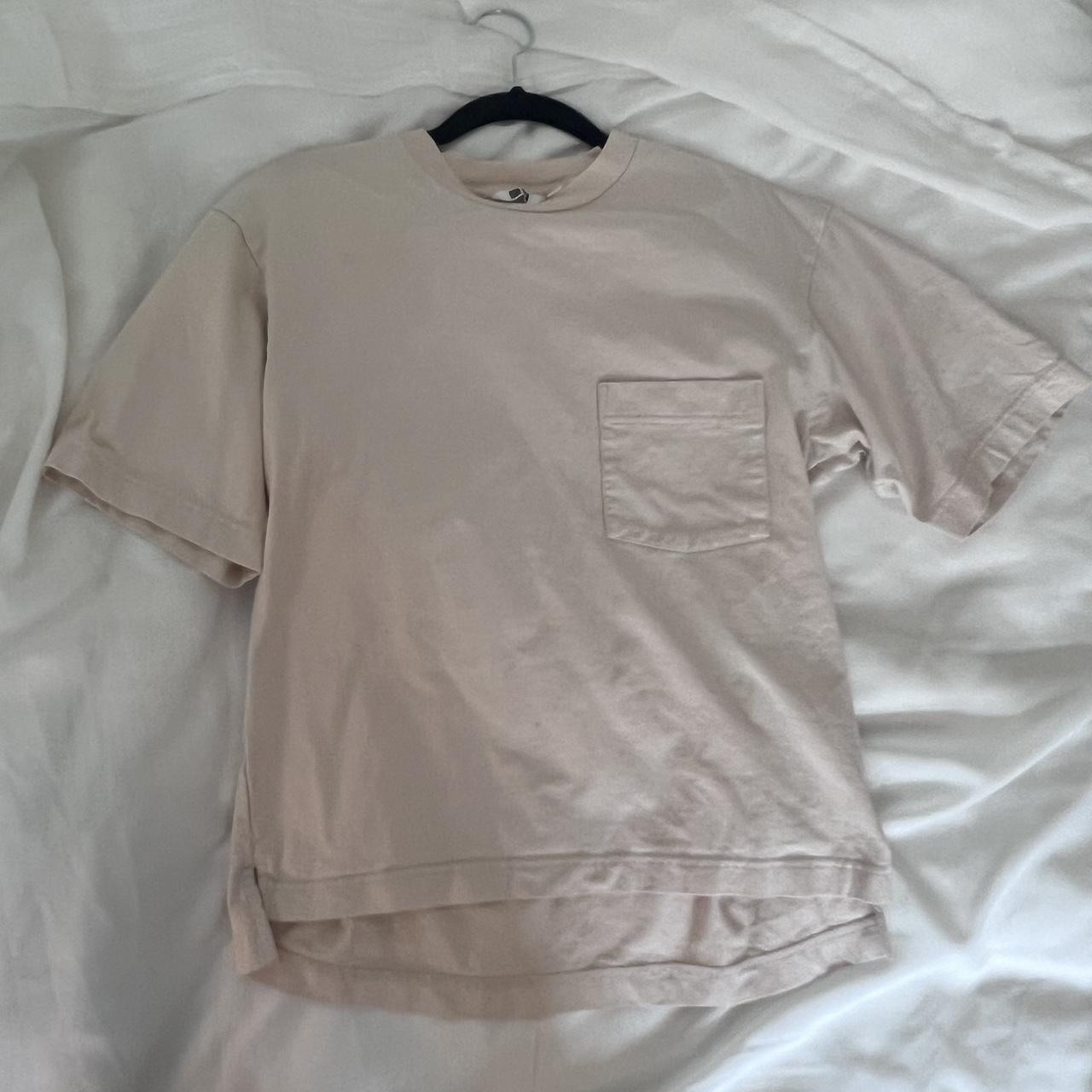 Cream colored uniqlo tee shirt with pocket Size xs... - Depop