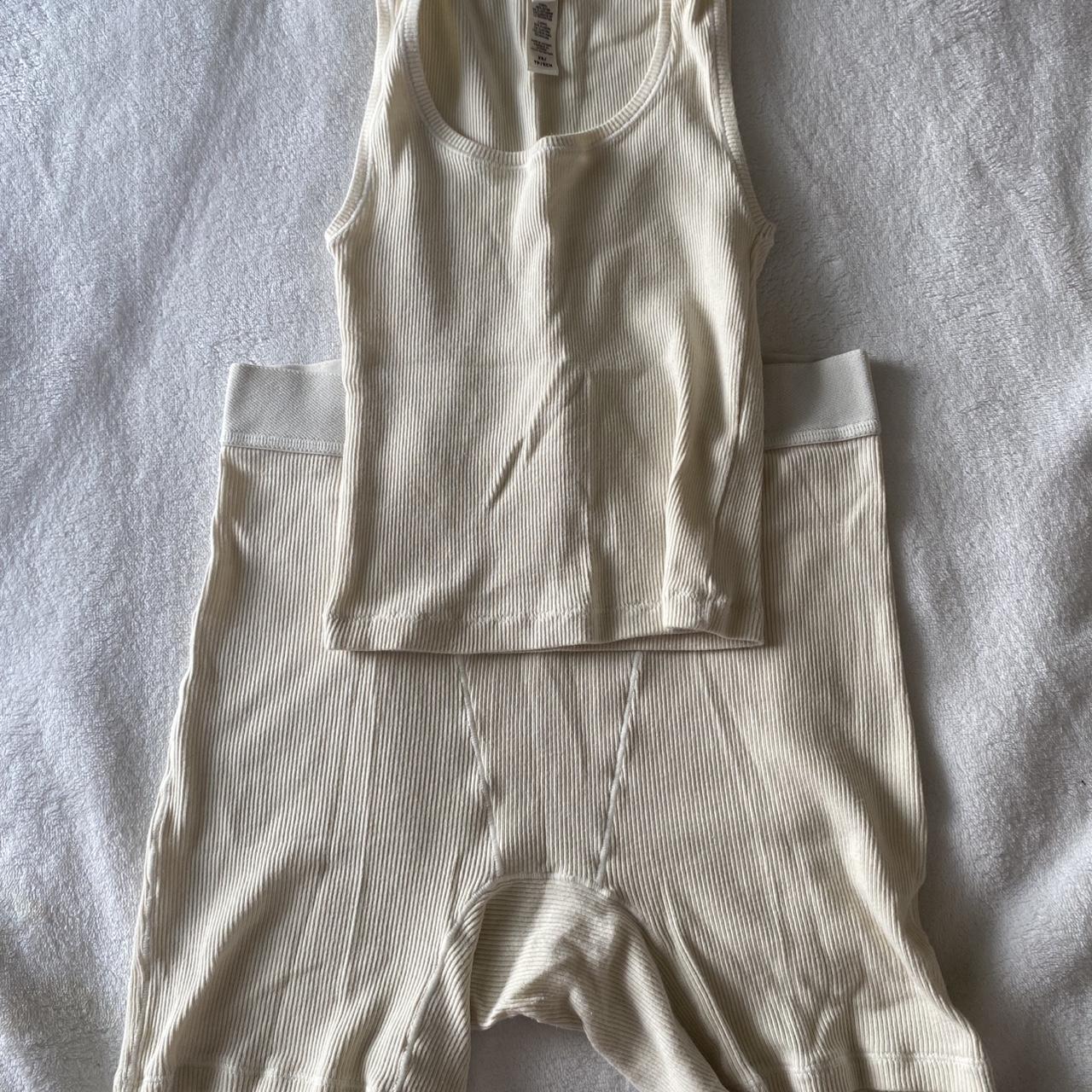 Skims cream ribbed lounge set. Top is xs and bottoms... | Depop