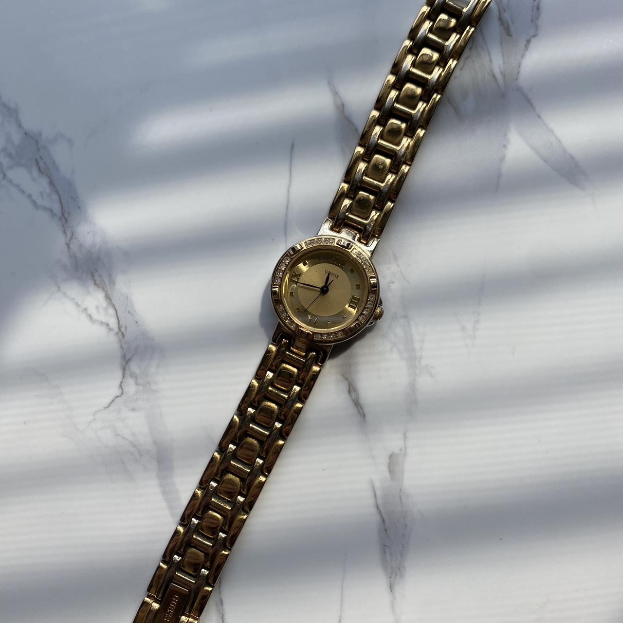 Gold Guess watch, has adjustable band. It has an... - Depop