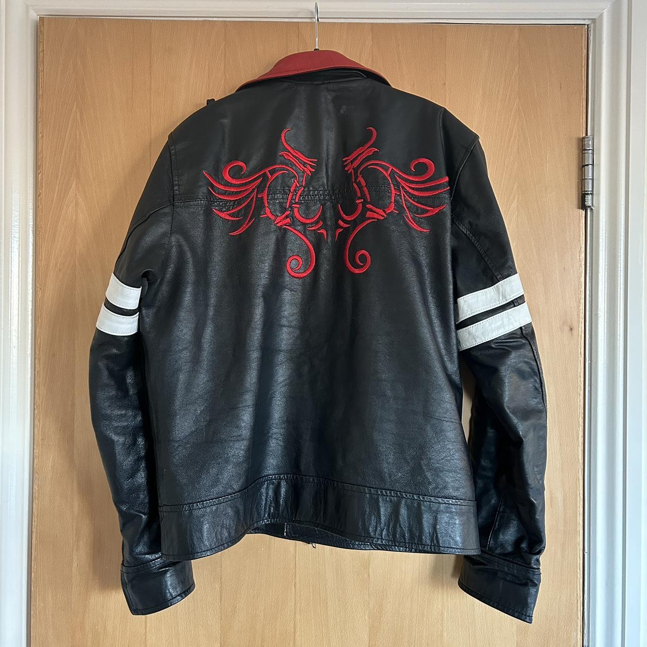 Real Leather embroidered biker jacket, size L Small... - Depop