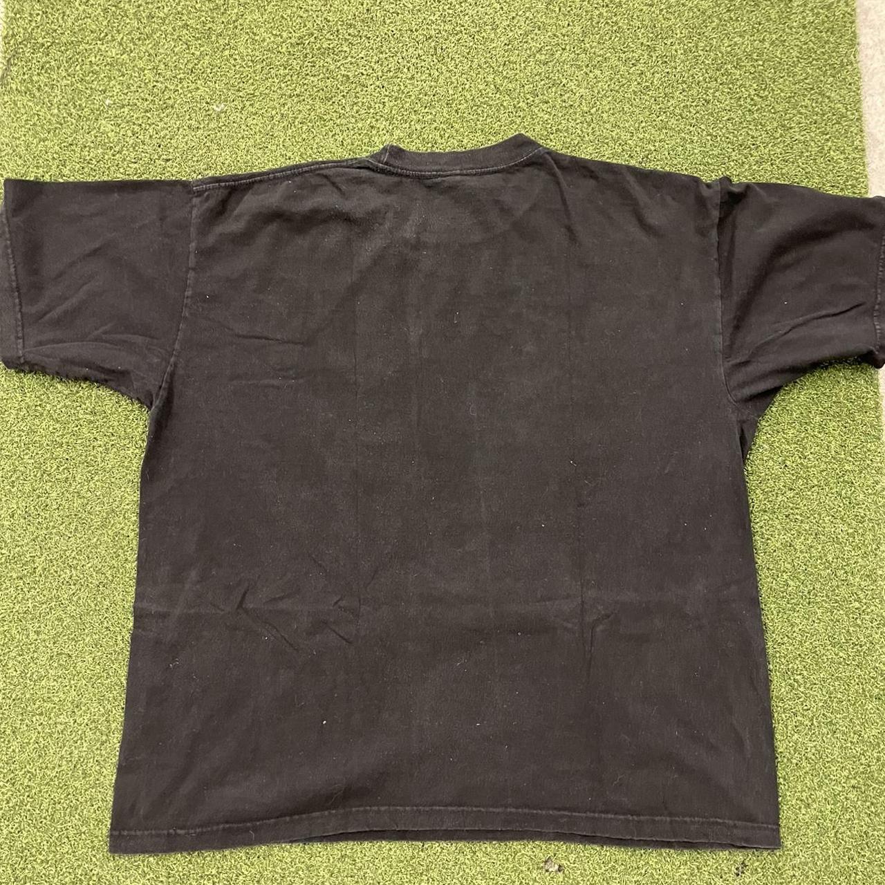 Super dope faded black raiders taz tshirt No flaws... - Depop