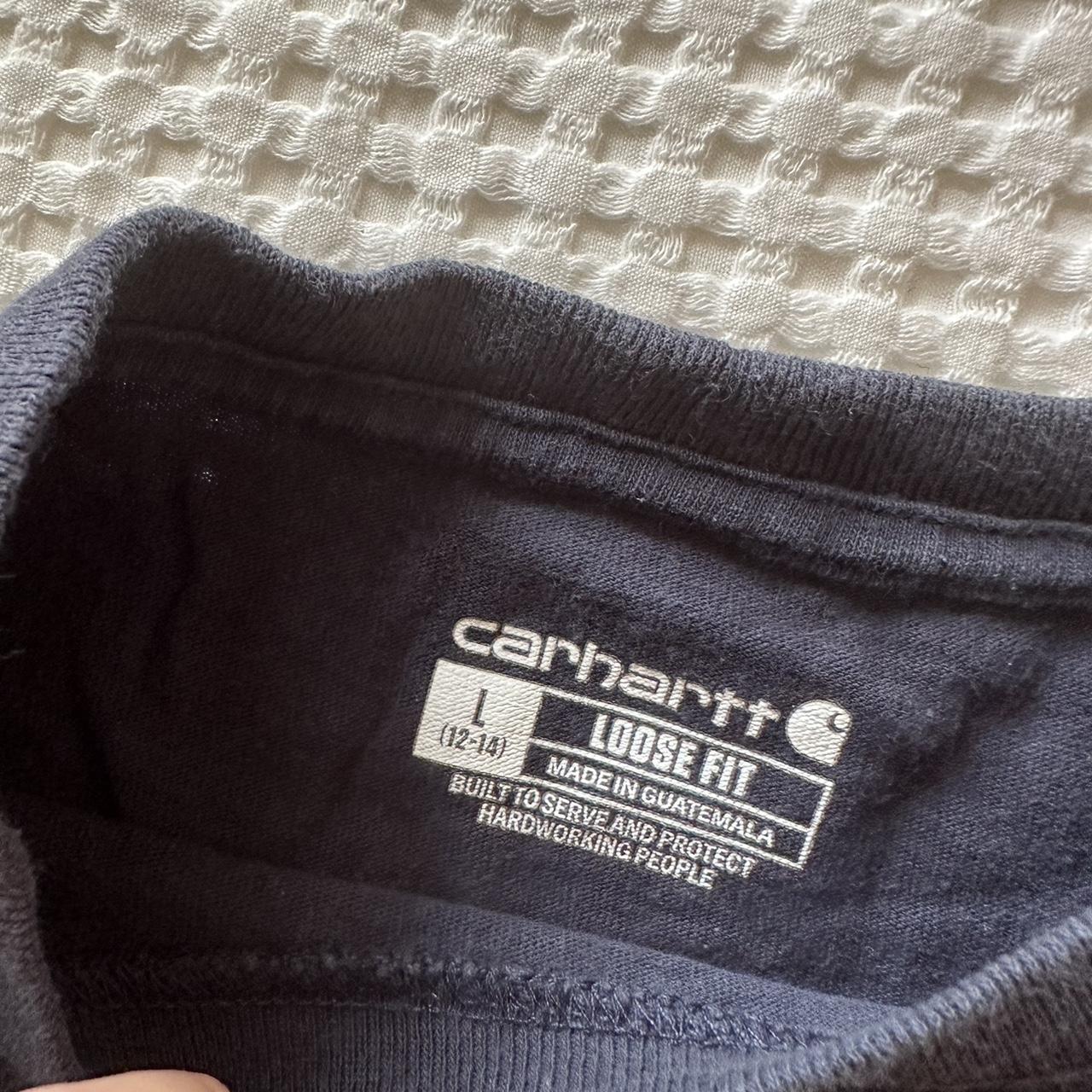 Carharrt navy men’s t shirt, the photo shows... - Depop