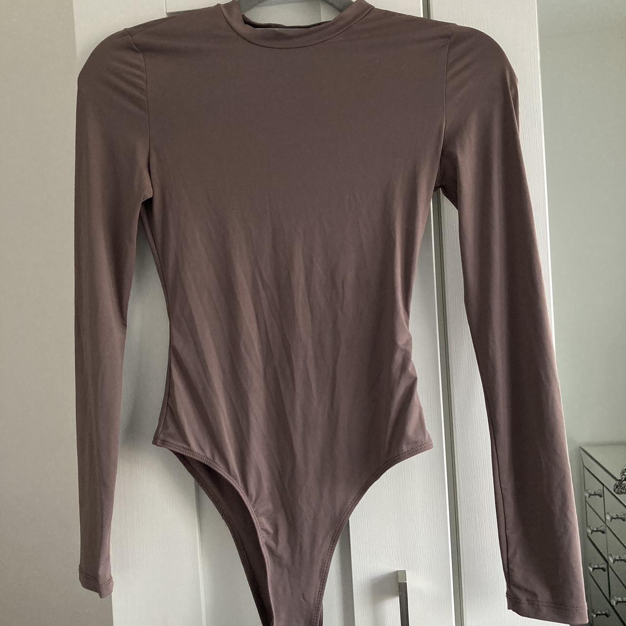basic body suit hugs your bodyyy stretchy and very... - Depop