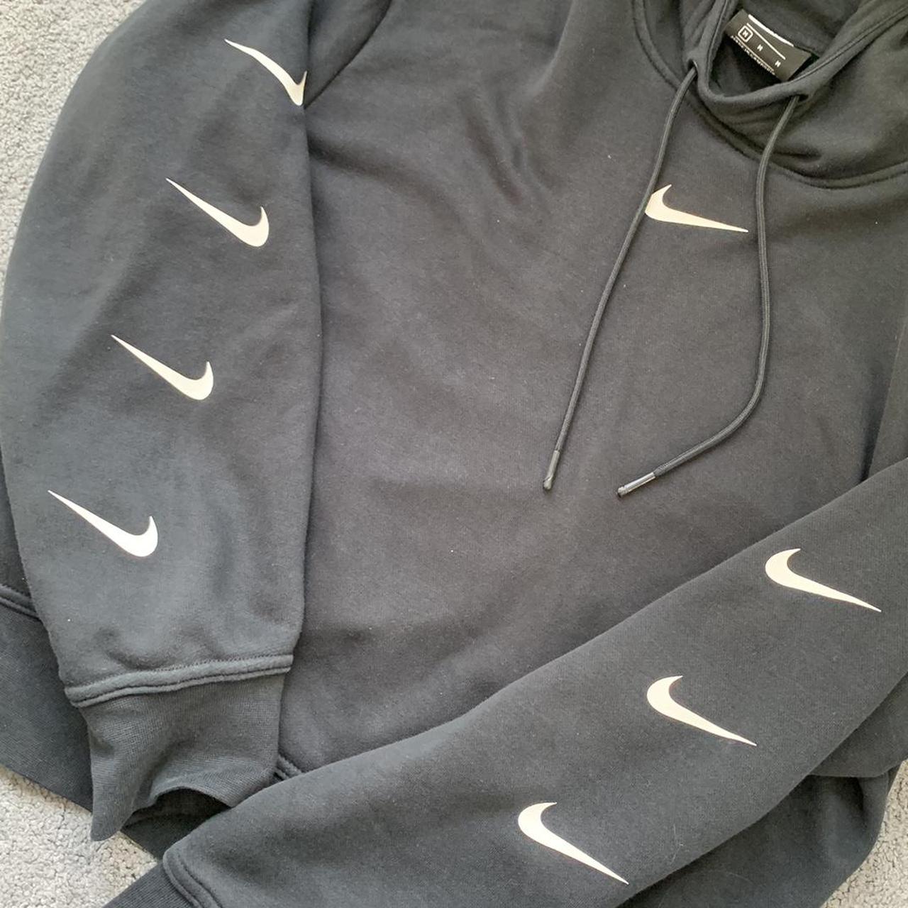 Black Nike hoodie, ticks all up the arms, size M,... - Depop