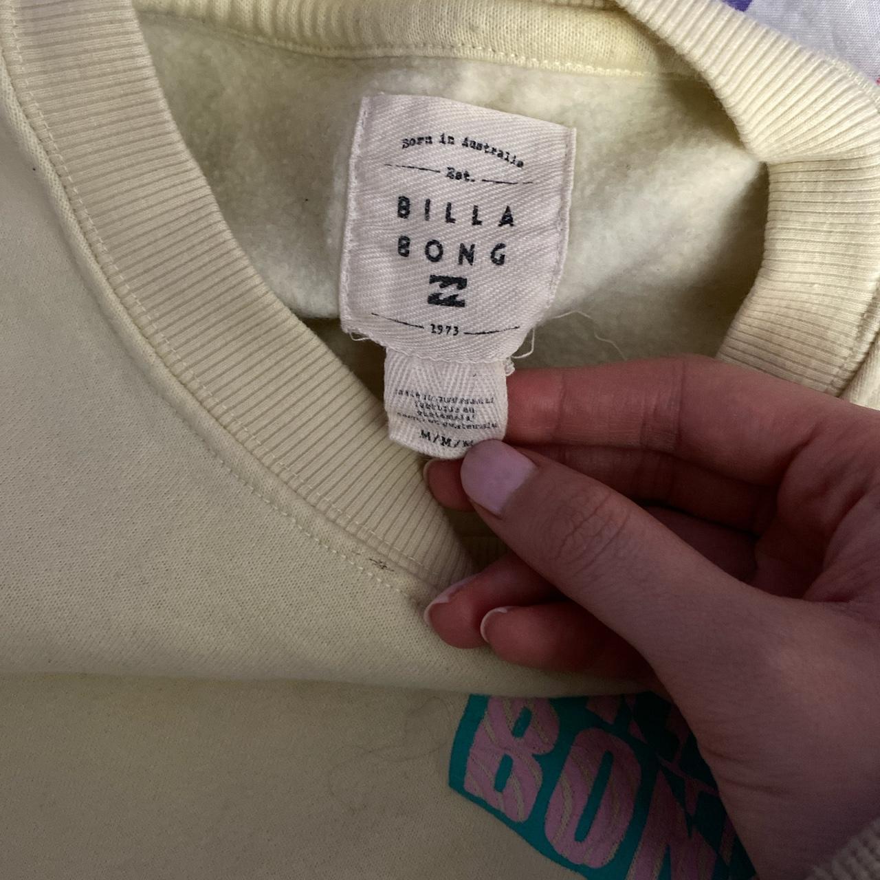 billa bong sweatshirt in pale yellow fits like... - Depop