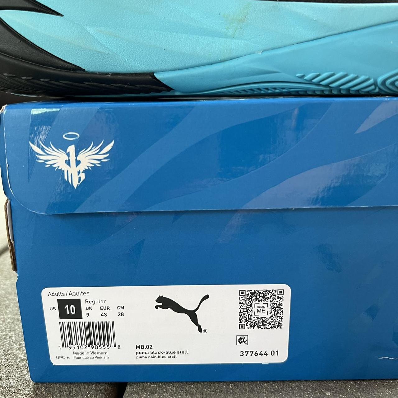 Puma Men's Black and Blue Trainers | Depop