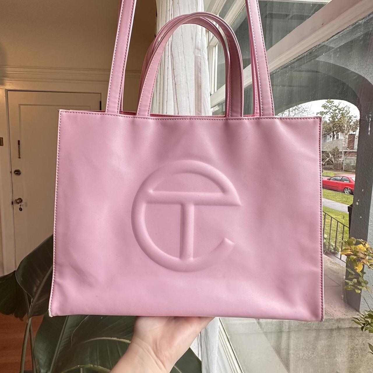 Medium light pink Telfar Bag! Lightly used, priced... - Depop