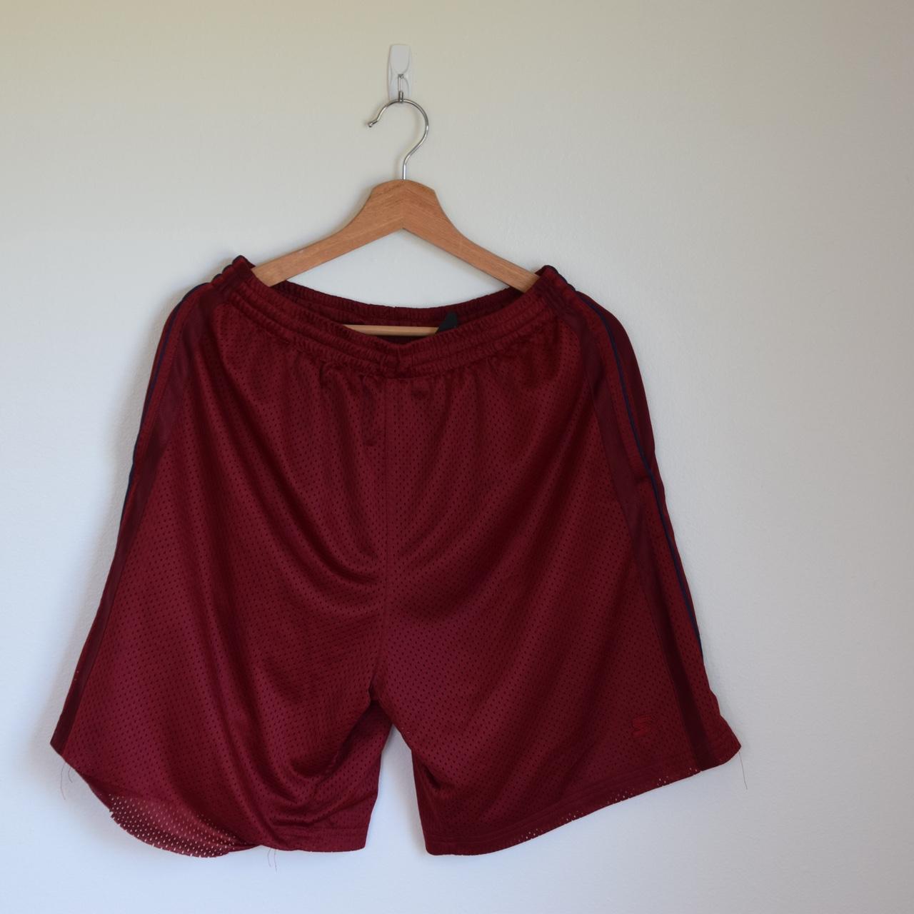 Red Starter Mesh Shorts Size M Right leg lining is... - Depop