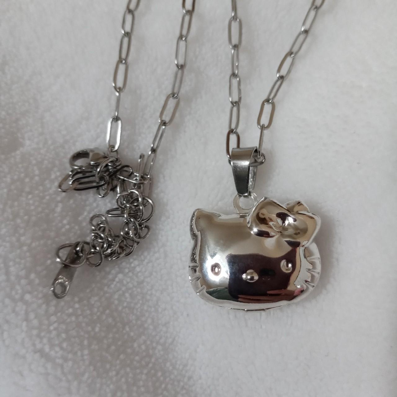 Hello kitty locket necklace Stainless steel Necklace... - Depop