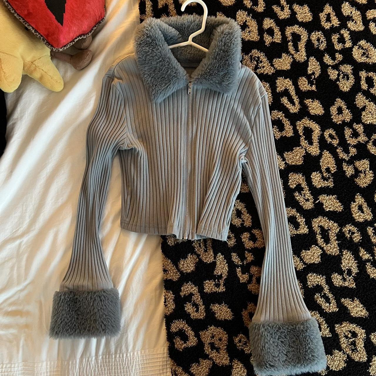 Baby blue fur collar and sleeve top. Reminds me of... - Depop