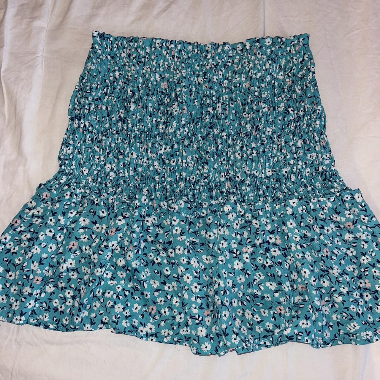 cute preppy blue skirt good luck gem size small but... - Depop