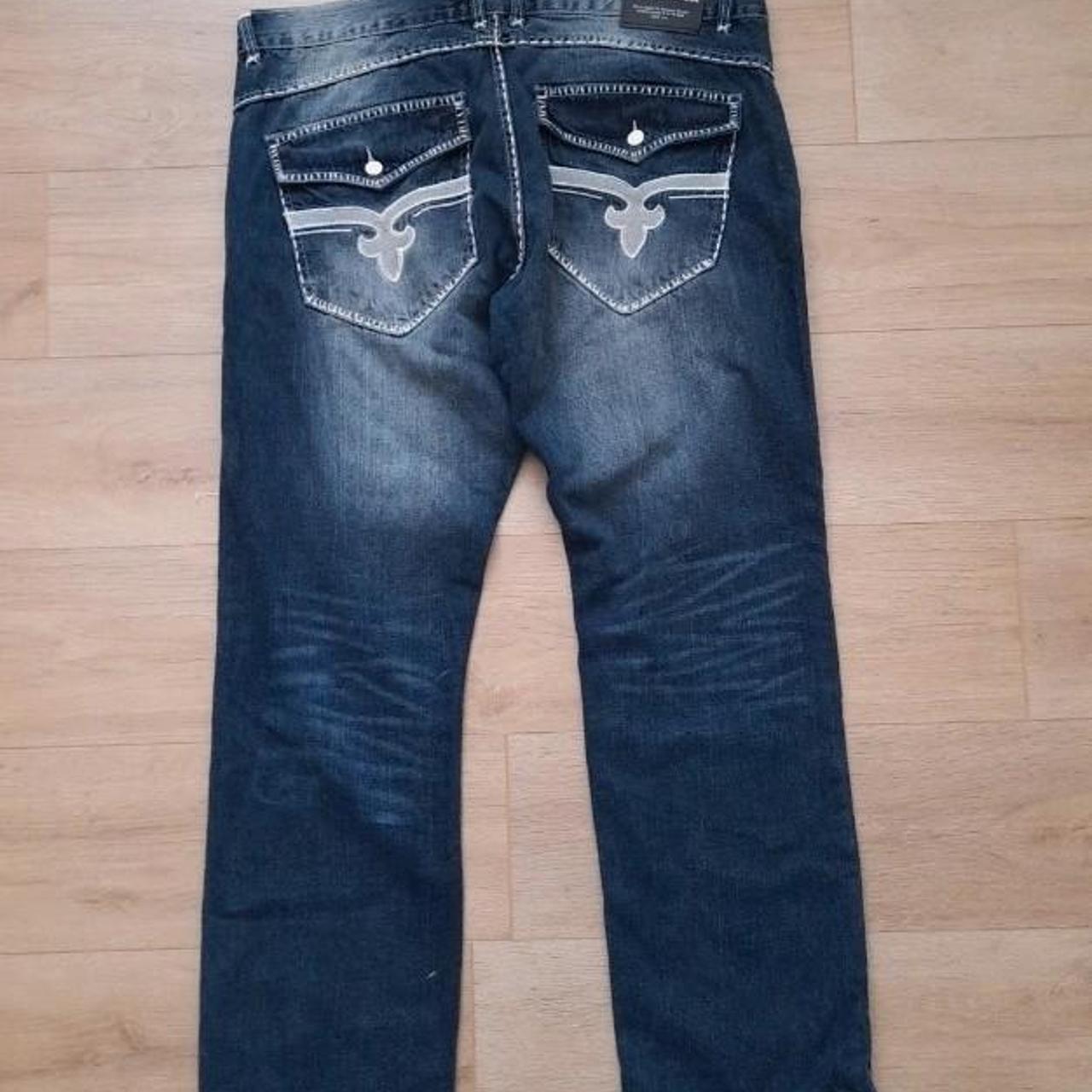 baggy contrast-stitch jeans w sick graphic on... - Depop