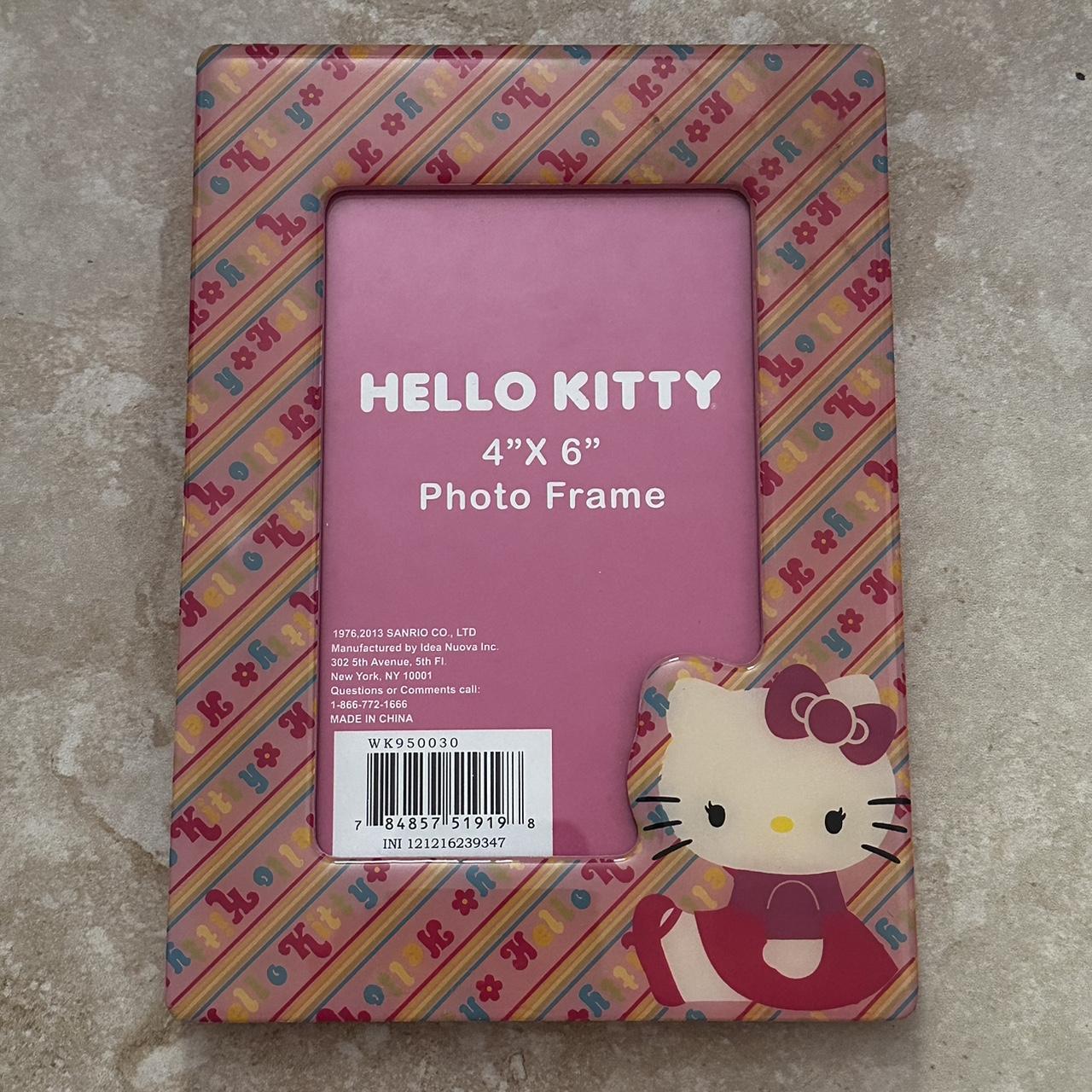 hello kitty picture frame never used, minor... - Depop