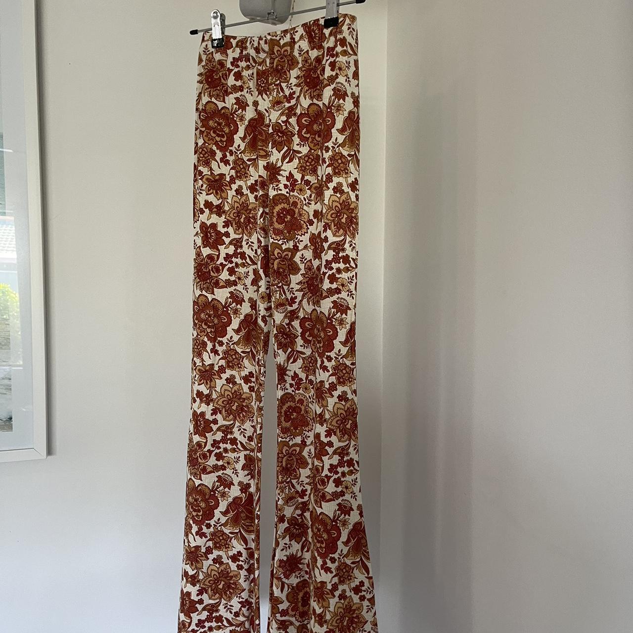 Ghanda body hugging, patterned flares Worn once,... - Depop