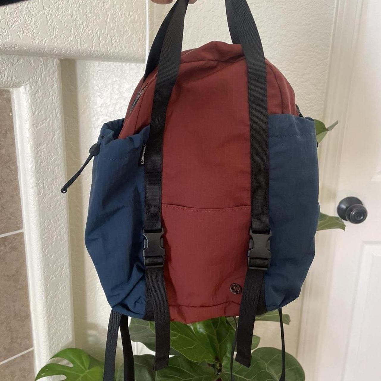 Lululemon navy and red backpack - Depop