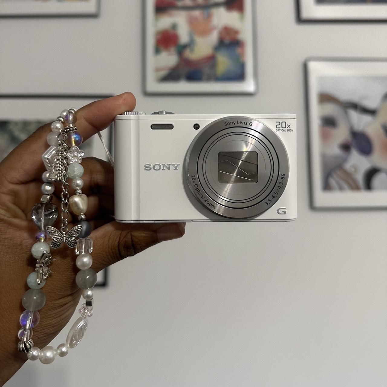 White and silver Sony Cyber-shot DSC-WX300 with 18.2... - Depop