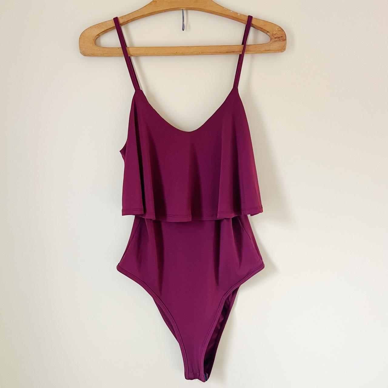 Trendy burgundy ruffle trim tank top style bodysuit... - Depop