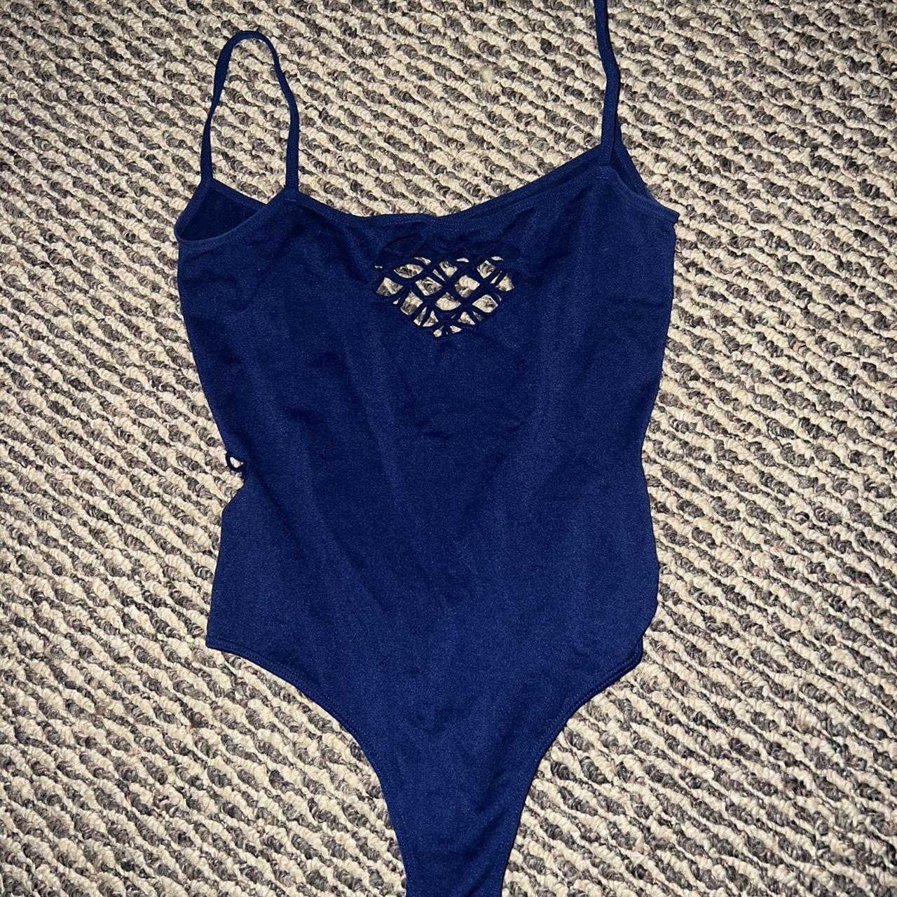 Insane fishnet bodysuit Has a heart cutout in the... - Depop
