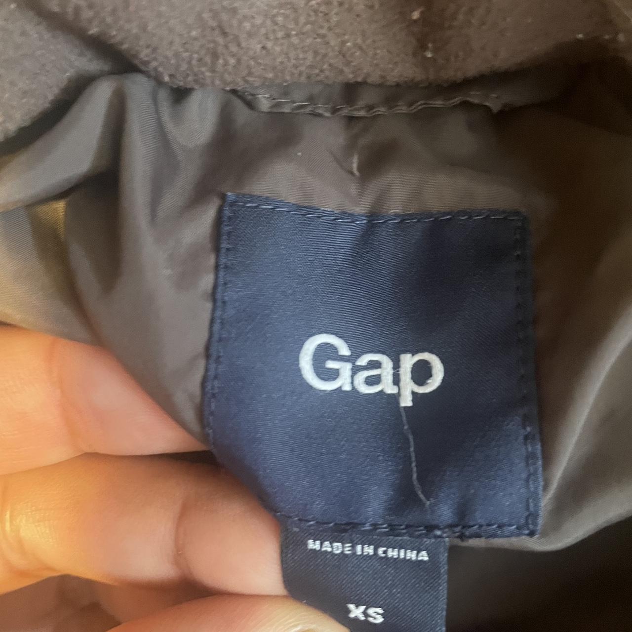 Brown xs gap puffer vest, good condition no stains... - Depop