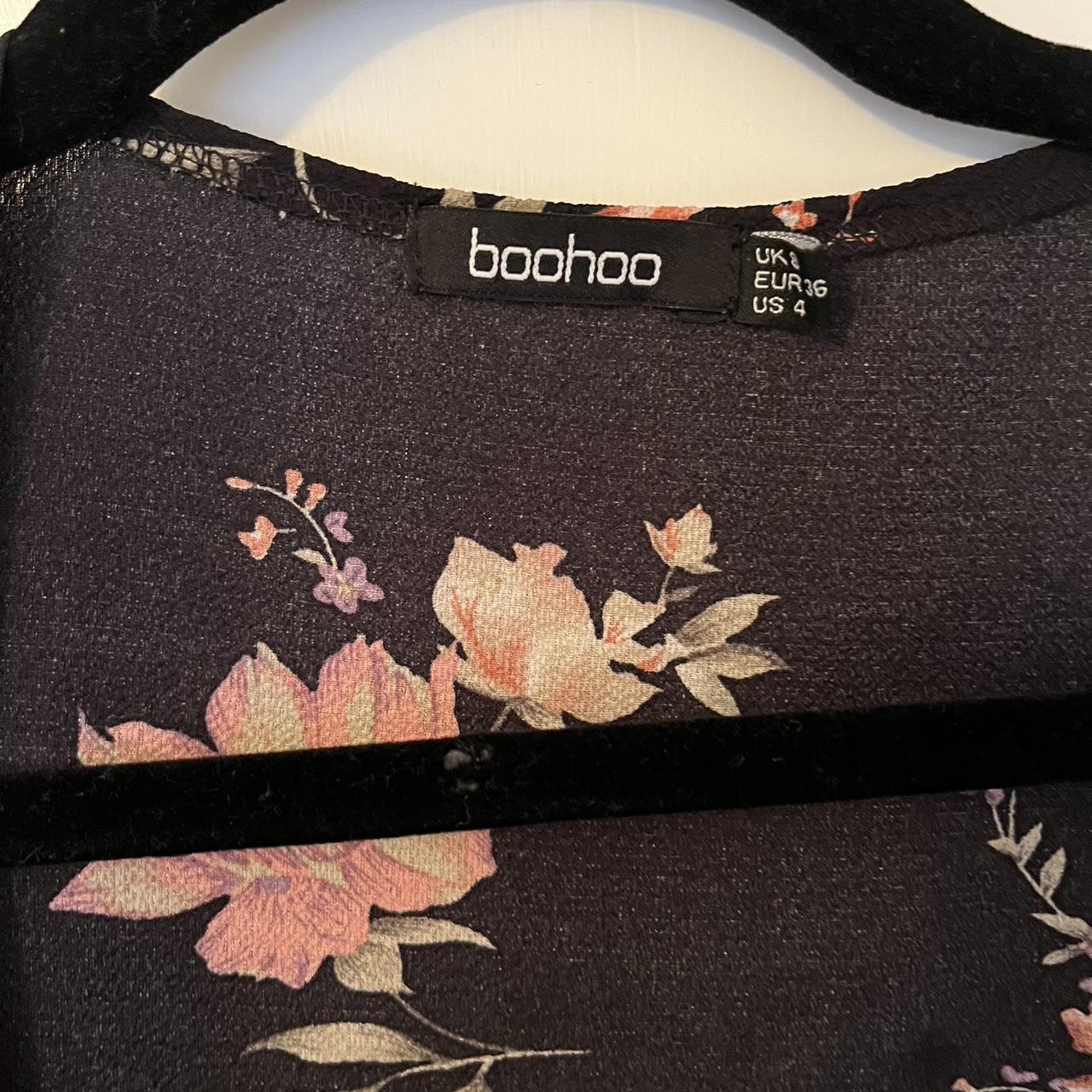 Boohoo wrap mini dress in floral pink with ruffle... - Depop