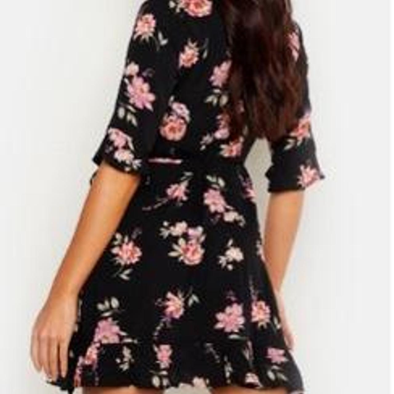 Boohoo wrap mini dress in floral pink with ruffle... - Depop