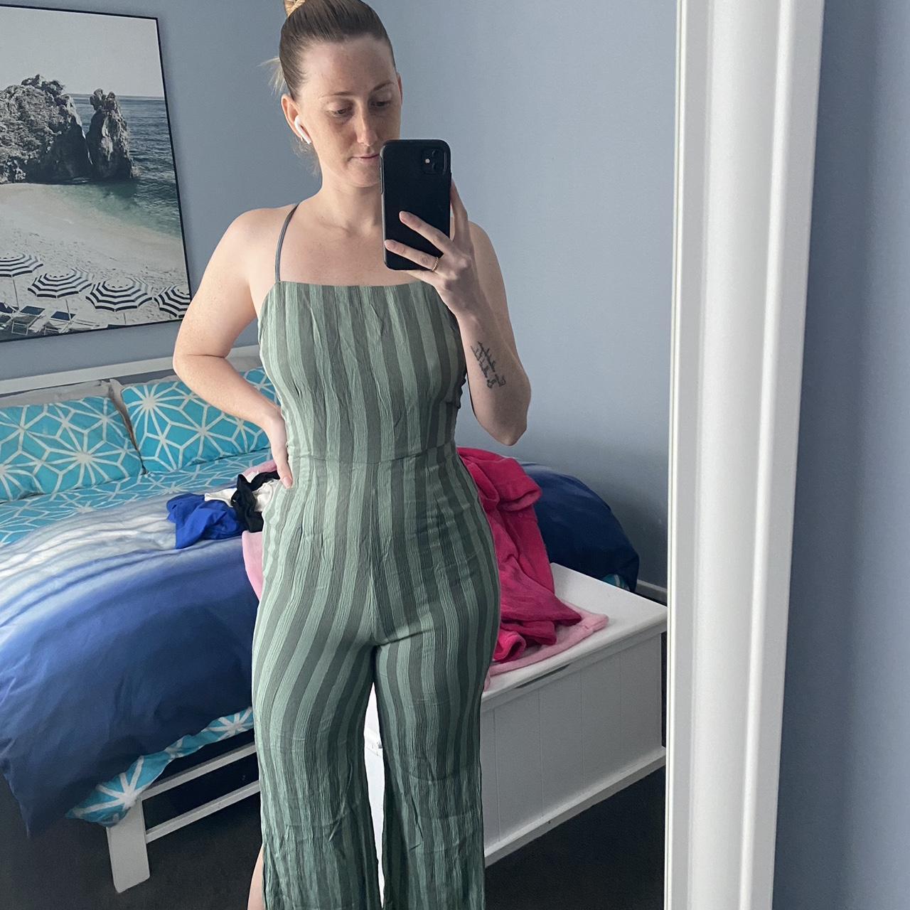 Green jumpsuit size XS has a bit of a baggy style... - Depop