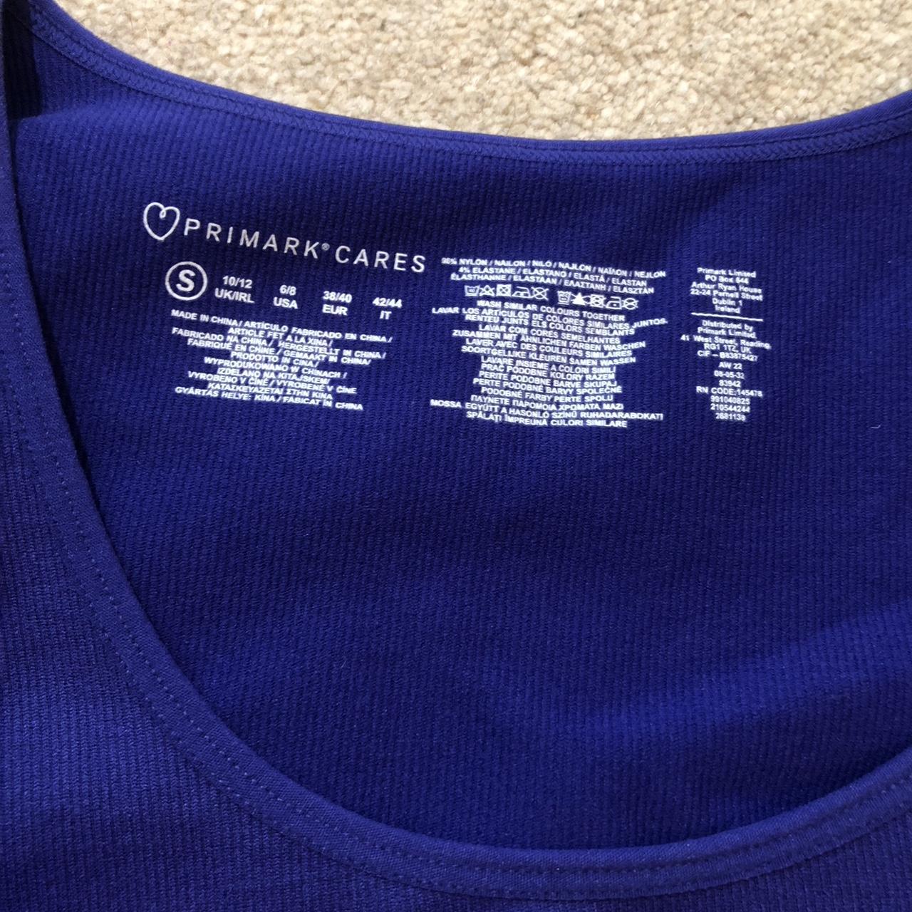 Dark purple crop top from Primark Size S would fit... - Depop