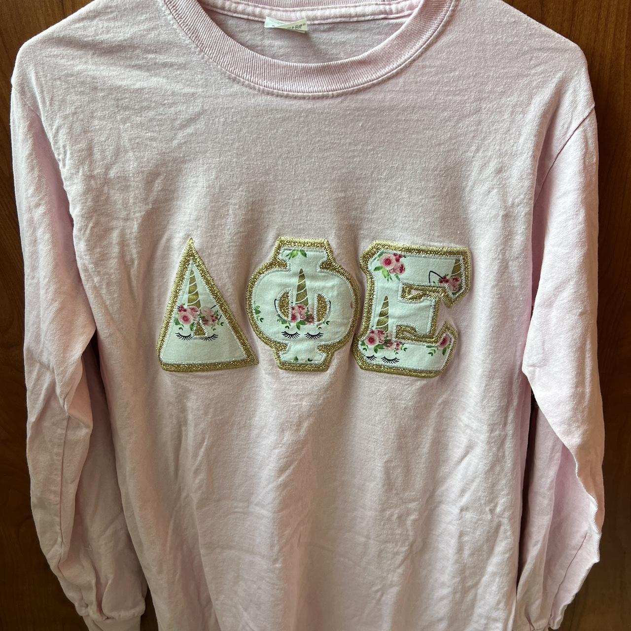 Delta Phi Epsilon long sleeve unicorn letter shirt... - Depop