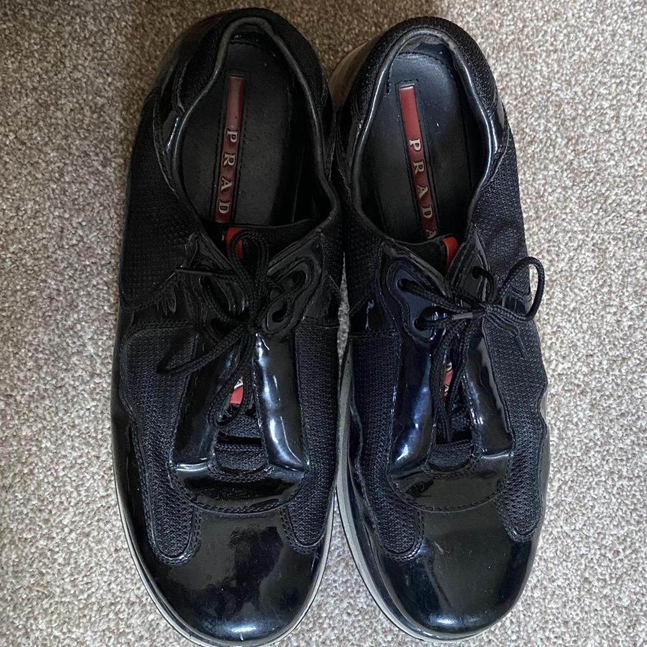 prada black patent trainers size 6. condition shown... - Depop