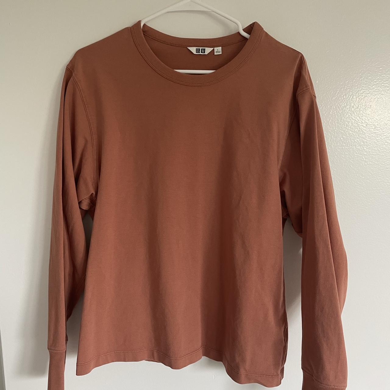 Uniqlo Long Sleeve sweater, color is a burnt orange.... - Depop