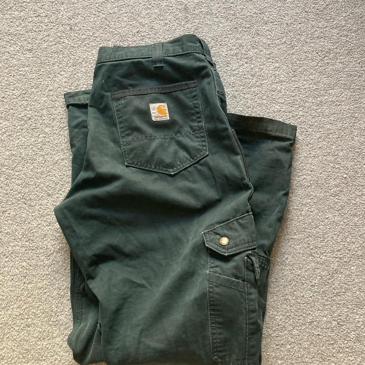 dark green carhartt work trousers vintage so... - Depop