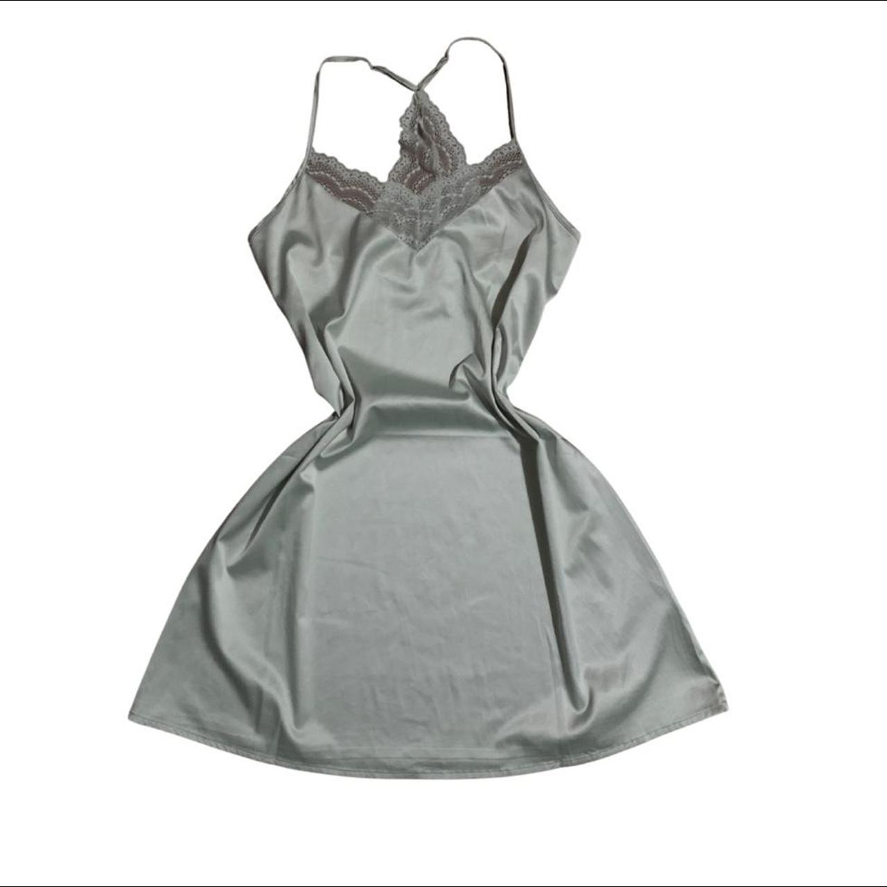 Pastel green silk slip mini dress with lace trim.... - Depop