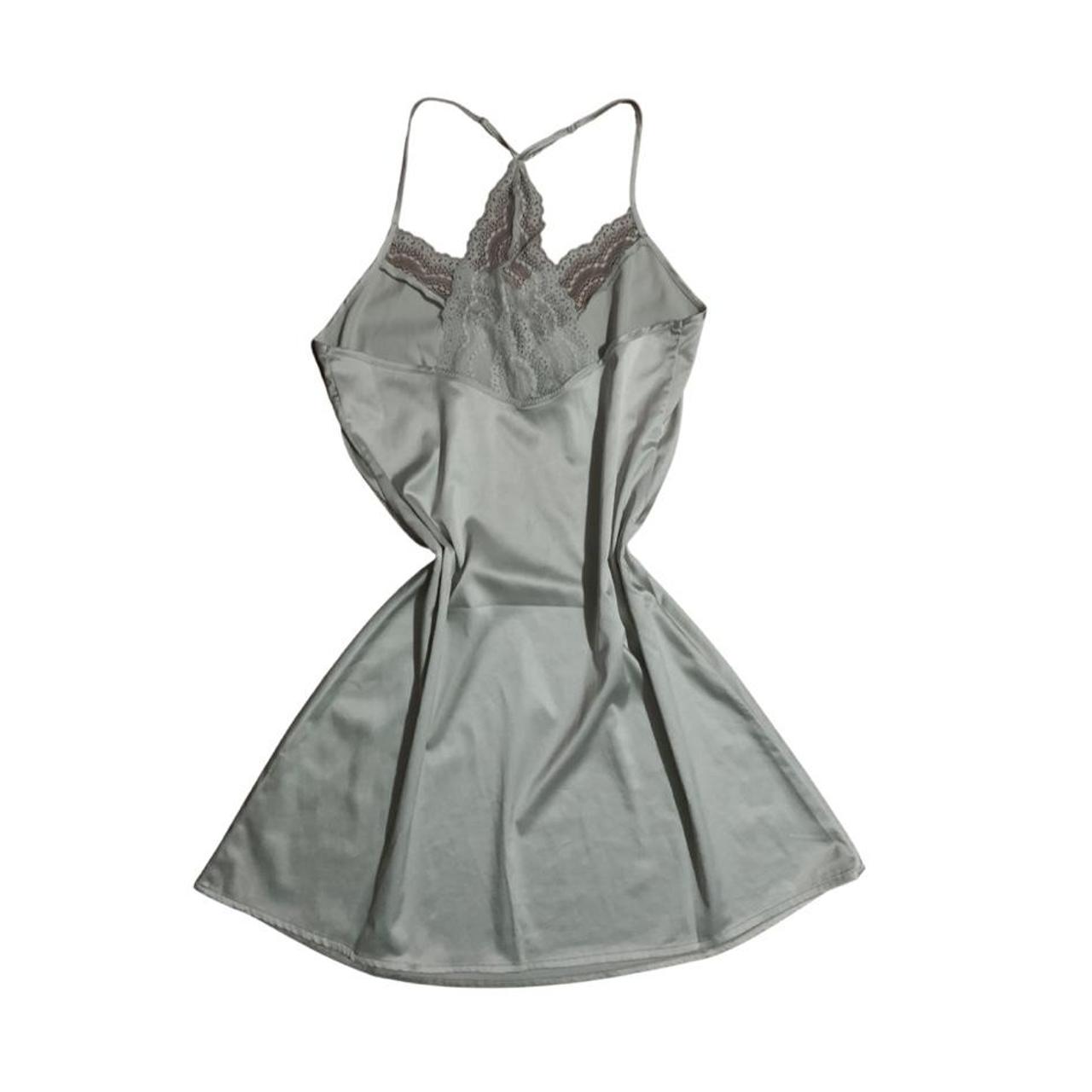 Pastel green silk slip mini dress with lace trim.... - Depop