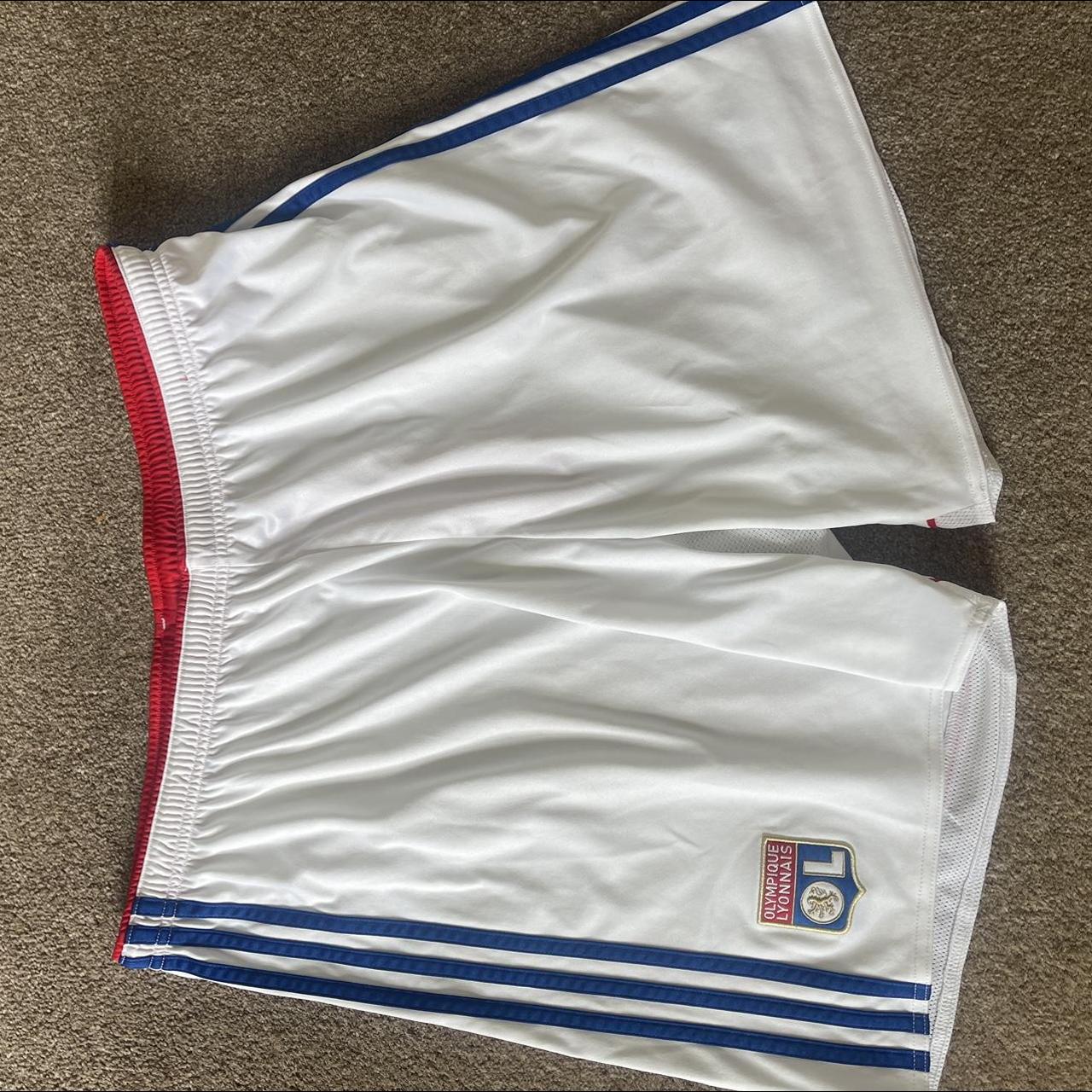 Olympique lyon FC shorts, perfect condition with no... - Depop