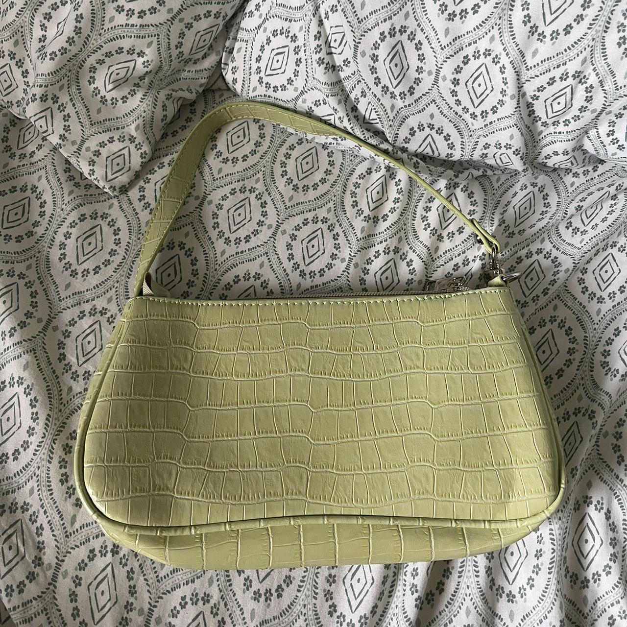 light green bag pretty small but still fits a lot no... - Depop