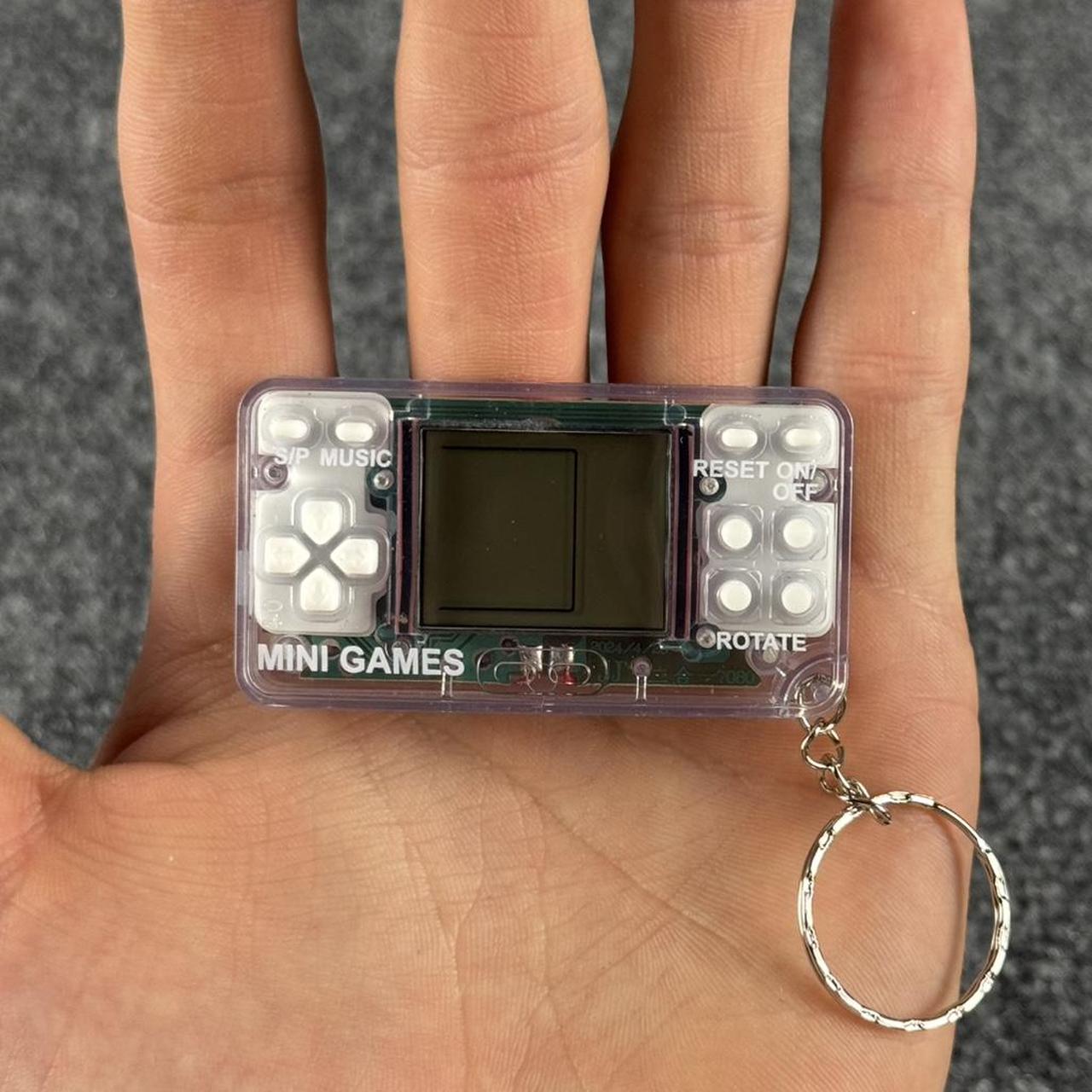 Mini Game Keychain - retro clear electronic... | Depop