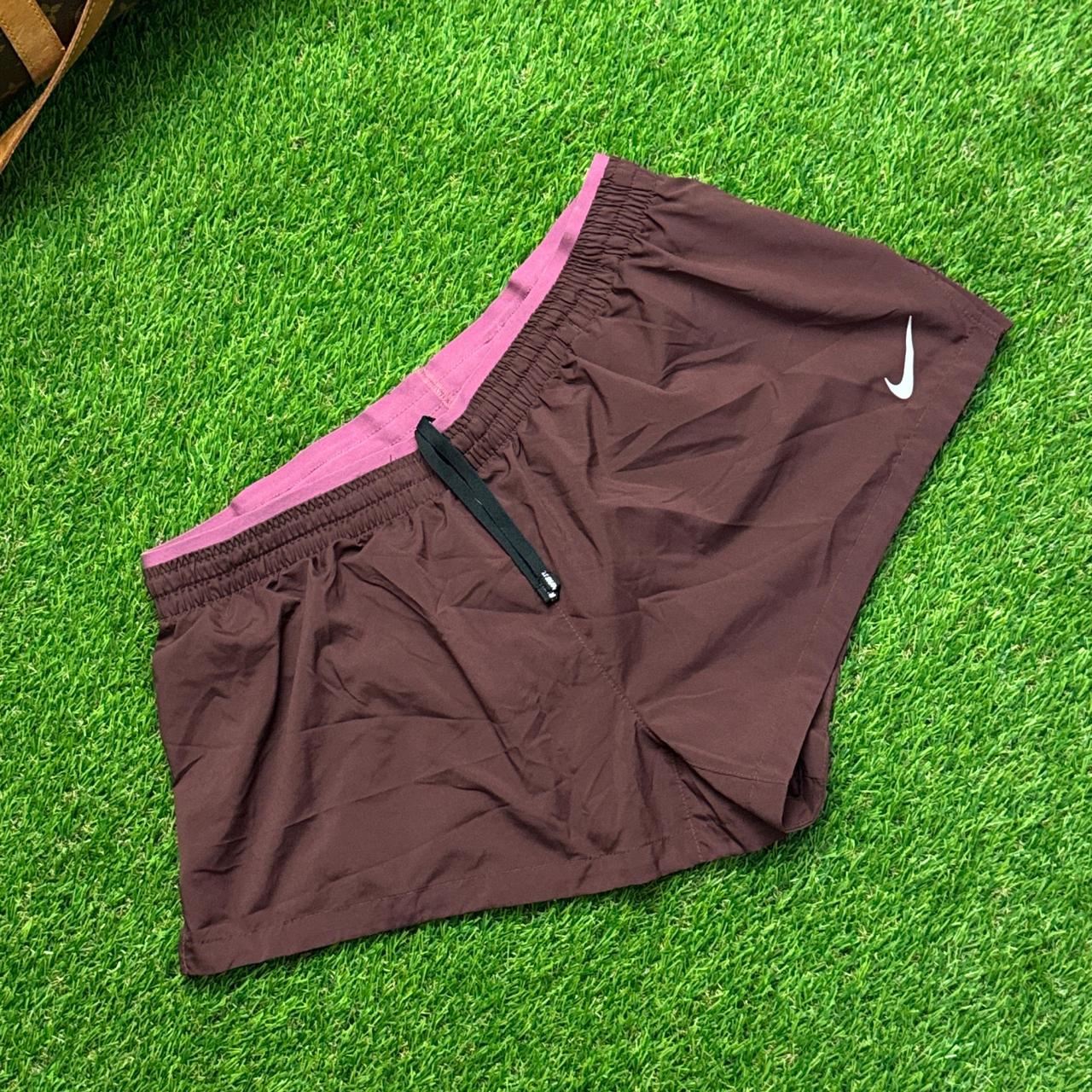 Nike burgundy and pink running shorts Size large | Depop