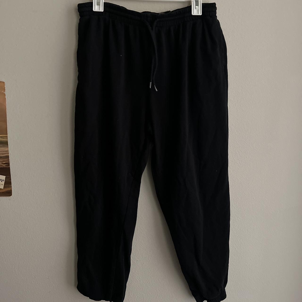 divided black sweatpants - Depop