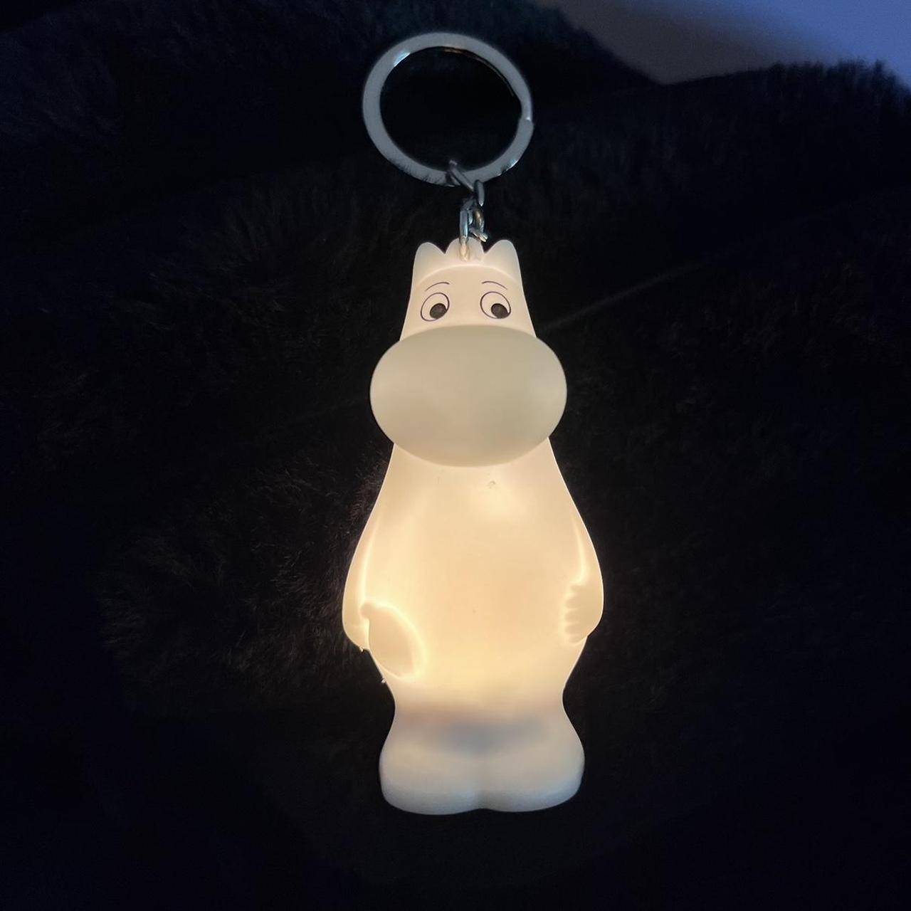 Light up glowing white plastic moomin keychain or... - Depop