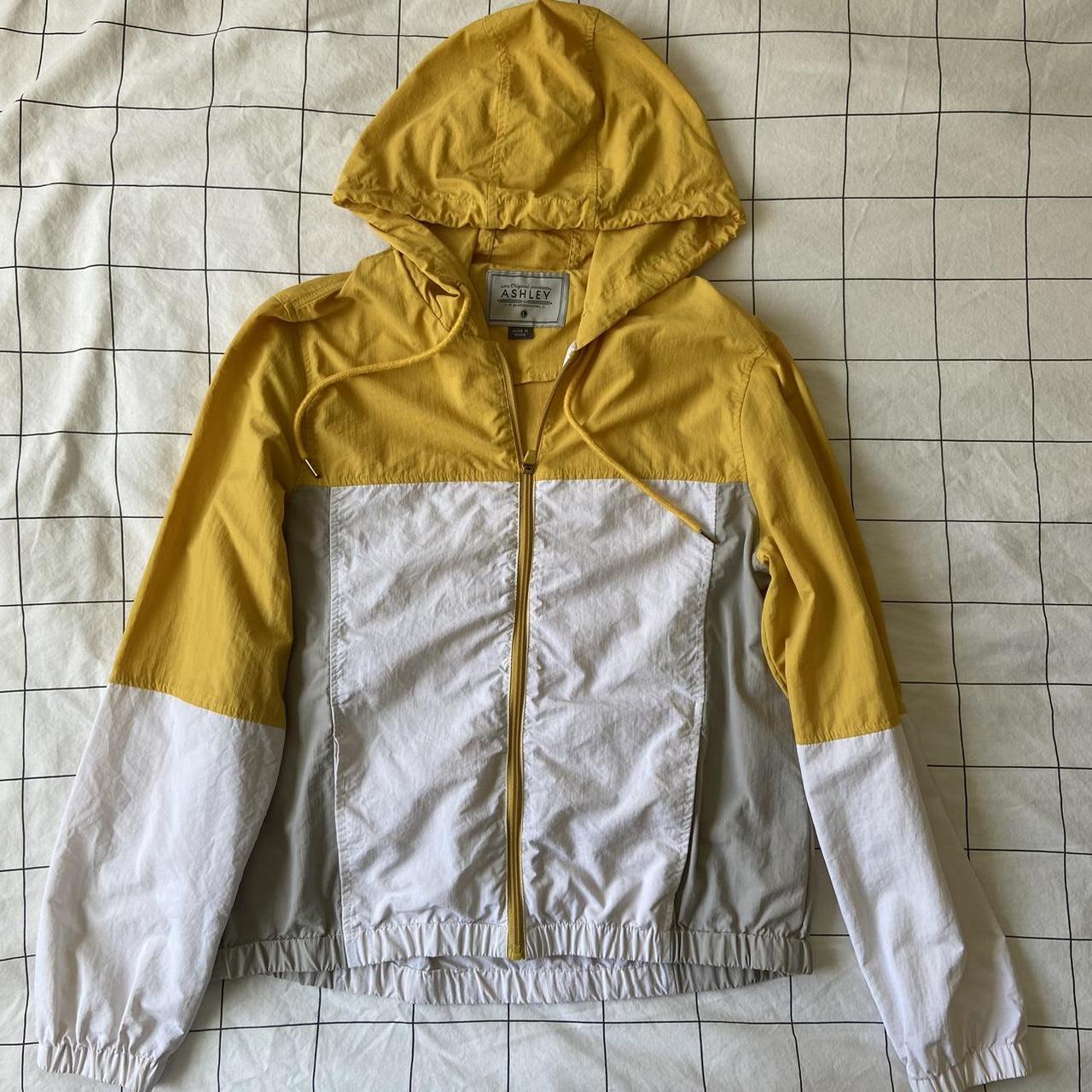 yellow zip up windbreaker, made with 100% nylon, has... - Depop