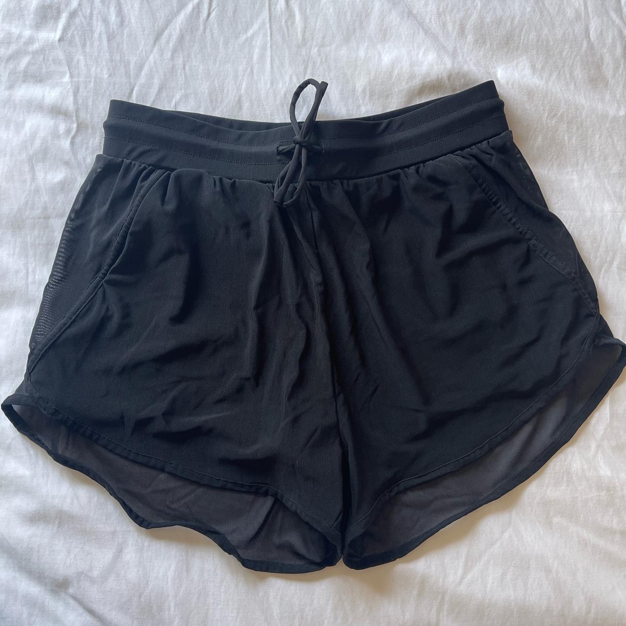 Large black halara running shorts In perfect... - Depop